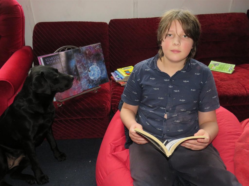 Myles reading to help others | ashburtoncourier.co.nz
